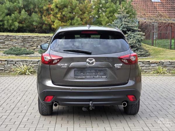Brown Mazda CX-5 2016 in Vilnius, with an engine capacity of 2.20 L and mileage of 225 thousand km for 8300 €, photo 8 on AUTOMOTO.COM.LV