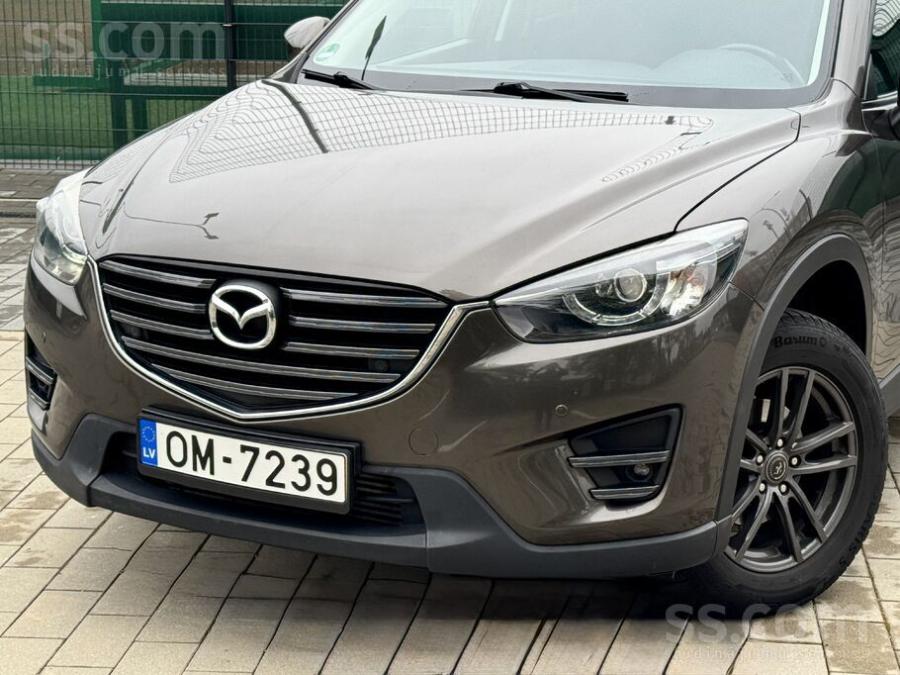 Brown Mazda CX-5 2016 in Jelgava, with an engine capacity of 2.20 L and mileage of 171 thousand km for 8900 €, photo 14 on AUTOMOTO.COM.LV