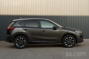Brown Mazda CX-5 2016 in Riga, with an engine capacity of 2.20 L and mileage of 159 thousand km for 11500 €, photo 6 on AUTOMOTO.COM.LV