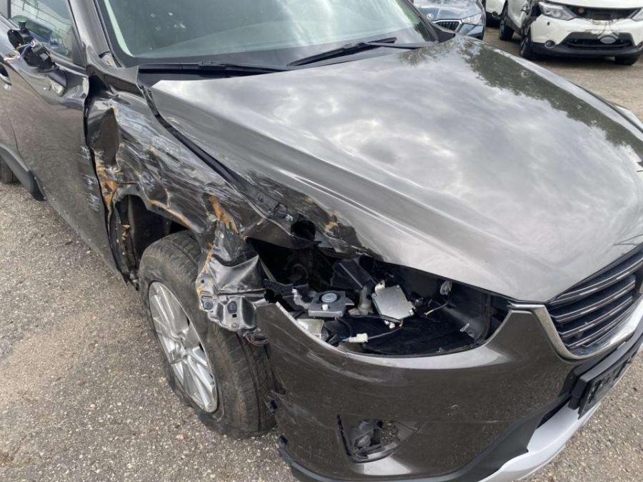 Brown Mazda CX-5 2016 in Radviliskis, with an engine capacity of 2.19 L and mileage of 219 thousand km for 5950 €, photo 7 on AUTOMOTO.COM.LV