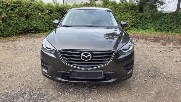 Brown Mazda CX-5 2016 in Prienai, with an engine capacity of 2.19 L and mileage of 150 thousand km for 8950 €, photo 1 on AUTOMOTO.COM.LV