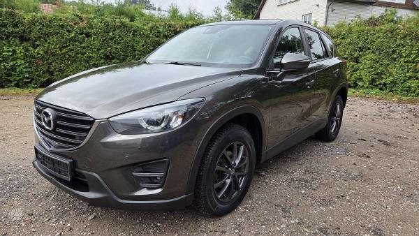 Brown Mazda CX-5 2016 in Prienai, with an engine capacity of 2.19 L and mileage of 150 thousand km for 8950 €, photo 3 on AUTOMOTO.COM.LV