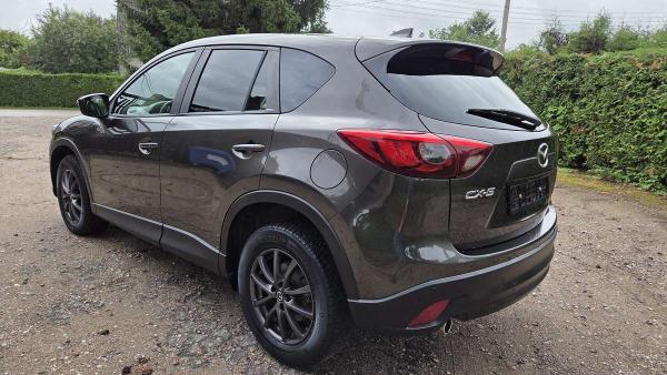 Brown Mazda CX-5 2016 in Prienai, with an engine capacity of 2.19 L and mileage of 150 thousand km for 8950 €, photo 5 on AUTOMOTO.COM.LV
