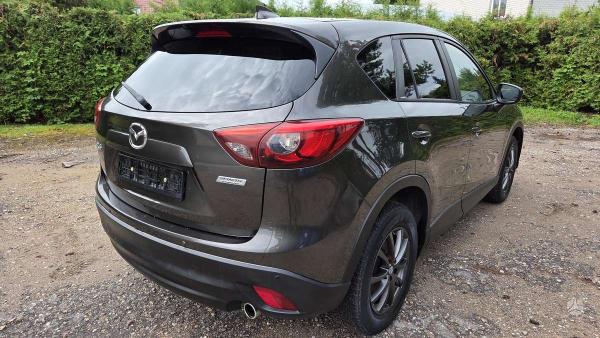 Brown Mazda CX-5 2016 in Prienai, with an engine capacity of 2.19 L and mileage of 150 thousand km for 8950 €, photo 7 on AUTOMOTO.COM.LV