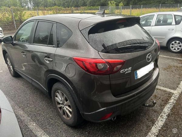 Brūns Mazda CX-5 2016 Tauragė, ar dzinēja tilpumu 2.19 L un nobraukumu 179 tūkst. km par 4700 €, foto 4 vietnē AUTOMOTO.COM.LV