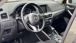 Brown Mazda CX-5 2017 in Telschi, with an engine capacity of 2.19 L and mileage of 179 thousand km for 10700 €, photo 13 on AUTOMOTO.COM.LV