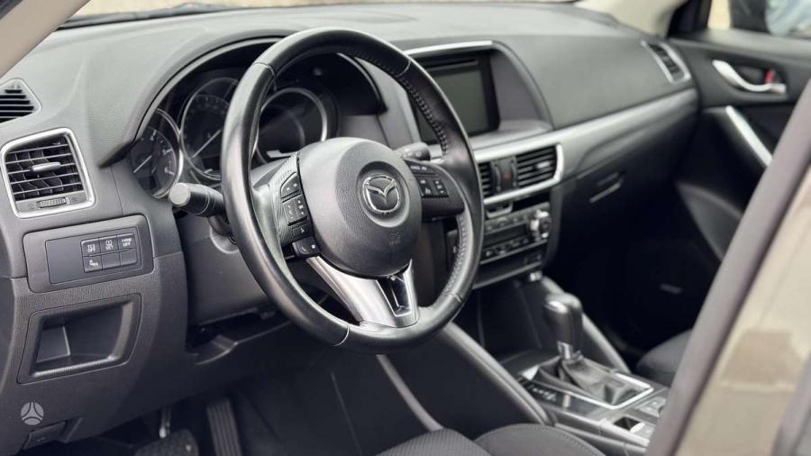 Brown Mazda CX-5 2017 in Telschi, with an engine capacity of 2.19 L and mileage of 179 thousand km for 10700 €, photo 13 on AUTOMOTO.COM.LV