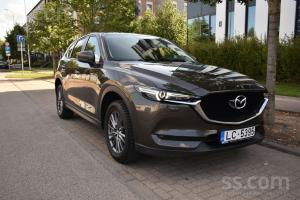 Brown Mazda CX-5 2018 in Riga, with an engine capacity of 2.00 L and mileage of 121 thousand km for 16700 €, photo  on AUTOMOTO.COM.LV