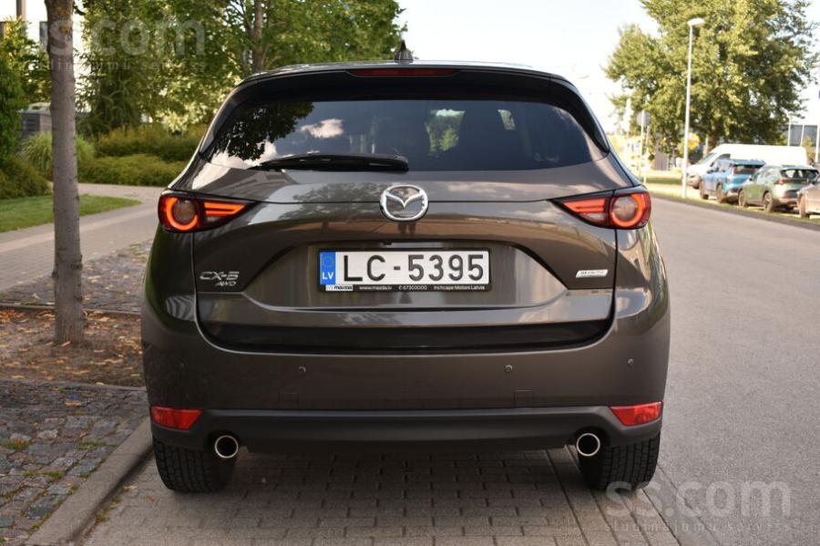 Brown Mazda CX-5 2018 in Riga, with an engine capacity of 2.00 L and mileage of 121 thousand km for 16700 €, photo 5 on AUTOMOTO.COM.LV