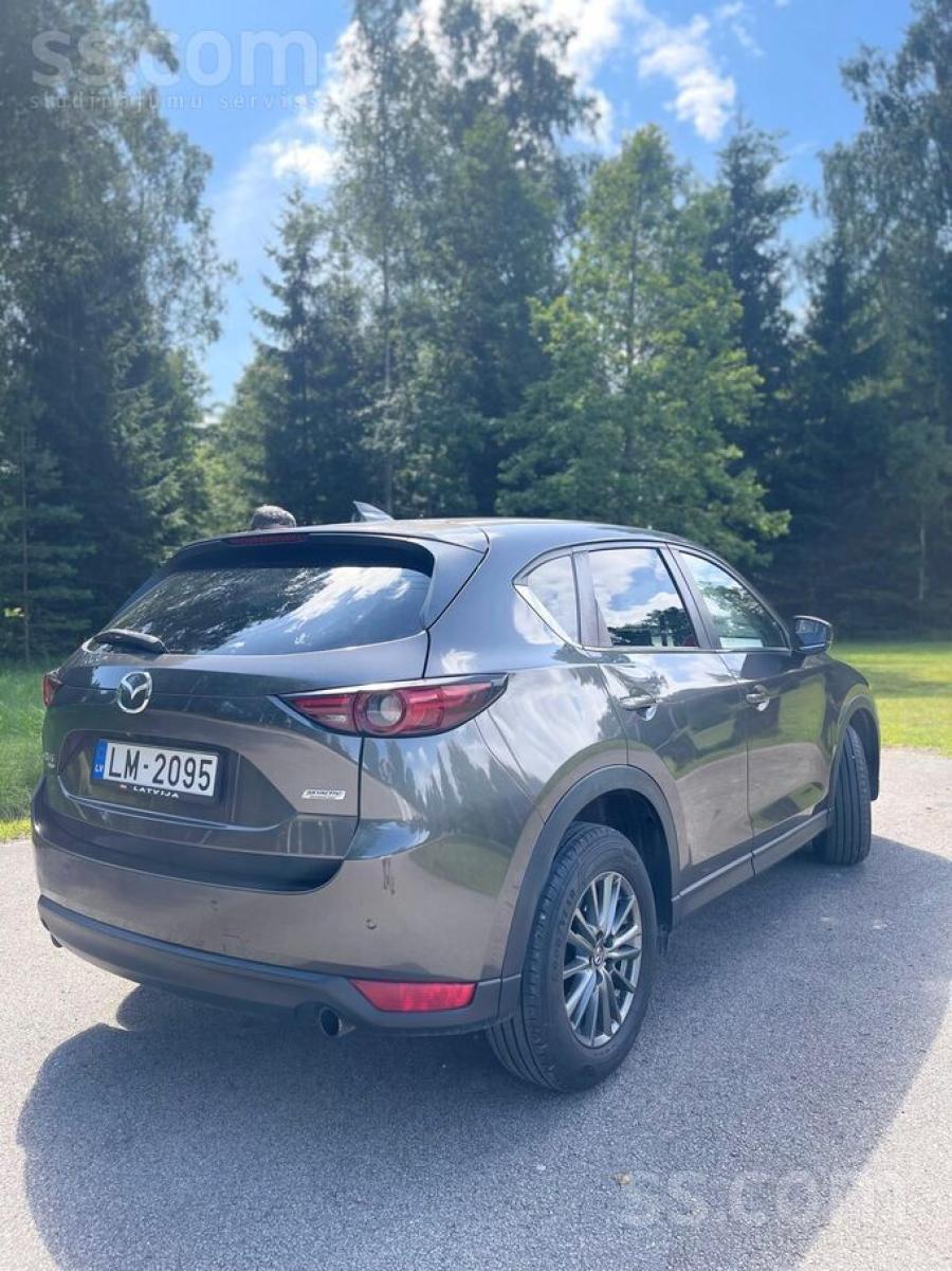 Brown Mazda CX-5 2018 in Riga, with an engine capacity of 2.00 L and mileage of 107 thousand km for 17500 €, photo 6 on AUTOMOTO.COM.LV