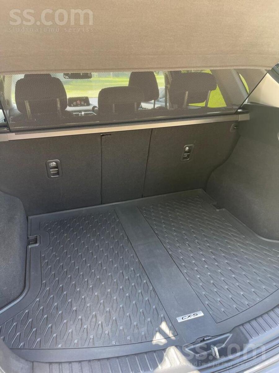 Brown Mazda CX-5 2018 in Riga, with an engine capacity of 2.00 L and mileage of 107 thousand km for 17500 €, photo 17 on AUTOMOTO.COM.LV