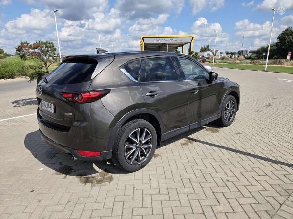 Brown Mazda CX-5 2017 in Taurage, with an engine capacity of 2.20 L and mileage of 223 thousand km for 10500 €, photo 5 on AUTOMOTO.COM.LV