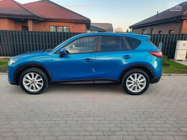 Mazda CX-5 2012 in Plunge, with an engine capacity of 2.20 L and mileage of 210 thousand km for 6900 €, photo 5 on AUTOMOTO.COM.LV