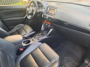 Mazda CX-5 2012 in Plunge, with an engine capacity of 2.20 L and mileage of 210 thousand km for 6900 €, photo 14 on AUTOMOTO.COM.LV