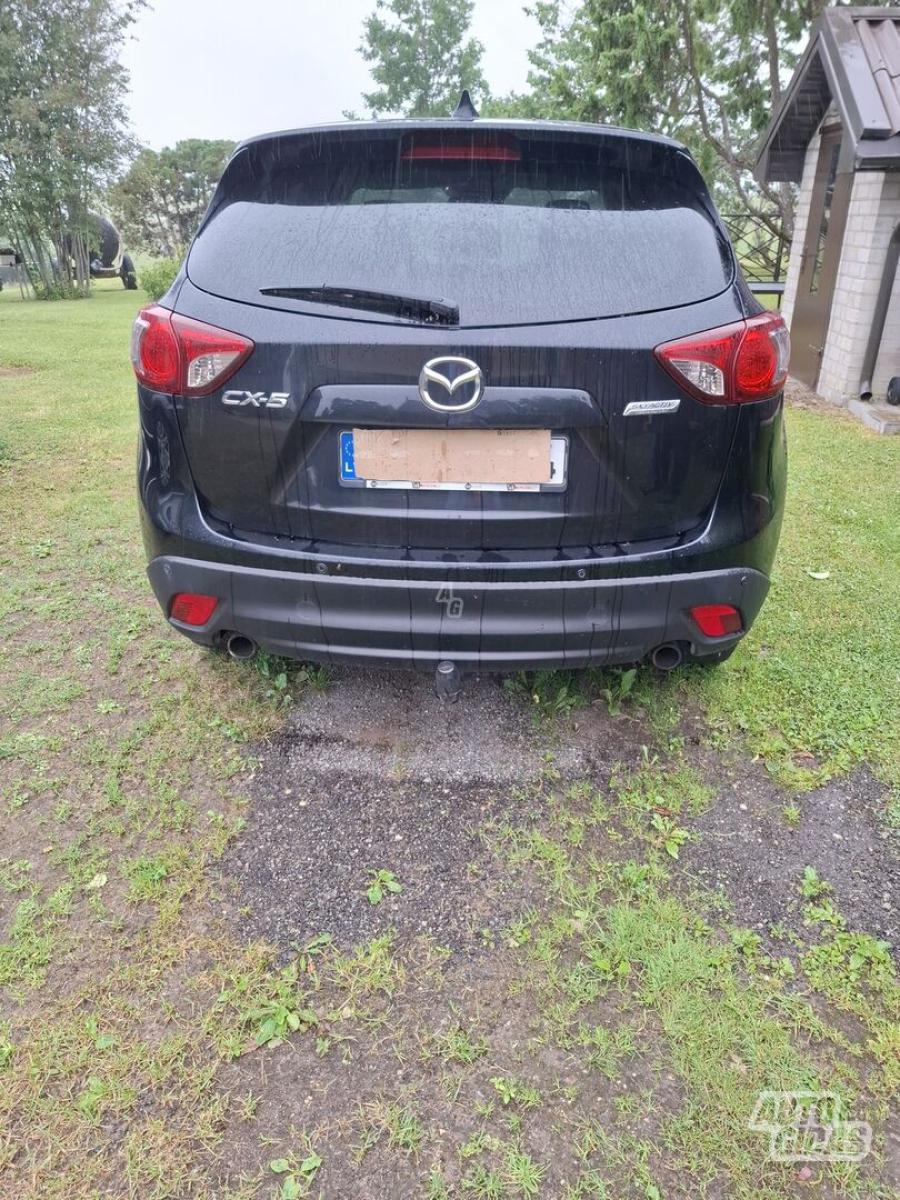 Mazda CX-5 2013 in Plunge, with an engine capacity of 2.20 L and mileage of 210 thousand km for 2500 €, photo 4 on AUTOMOTO.COM.LV
