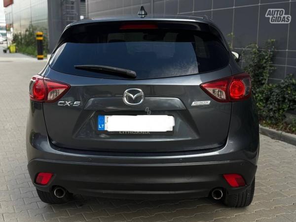 Mazda CX-5 2013 Klaipėda, ar dzinēja tilpumu 2.20 L un nobraukumu 297 tūkst. km par 5950 €, foto 11 vietnē AUTOMOTO.COM.LV