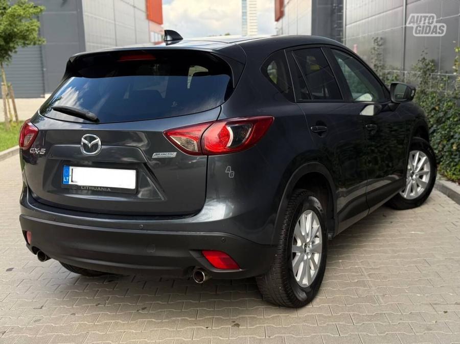 Mazda CX-5 2013 in Klaipeda, with an engine capacity of 2.20 L and mileage of 297 thousand km for 5950 €, photo 12 on AUTOMOTO.COM.LV