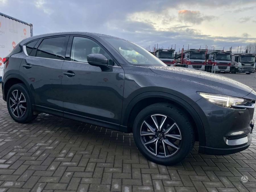 Green Mazda CX-5 2017 in Taurage, with an engine capacity of 2.19 L and mileage of 200 thousand km for 12500 €, photo 3 on AUTOMOTO.COM.LV