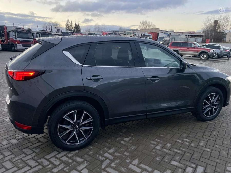 Green Mazda CX-5 2017 in Taurage, with an engine capacity of 2.19 L and mileage of 200 thousand km for 12500 €, photo 5 on AUTOMOTO.COM.LV
