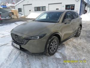 Green Mazda CX-5 2023 in Riga, with an engine capacity of 2.50 L and mileage of 52 thousand km for 25000 €, photo 3 on AUTOMOTO.COM.LV