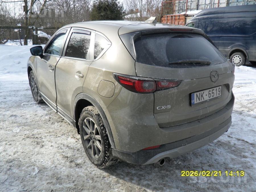 Green Mazda CX-5 2023 in Riga, with an engine capacity of 2.50 L and mileage of 52 thousand km for 25000 €, photo 5 on AUTOMOTO.COM.LV