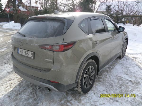 Green Mazda CX-5 2023 in Riga, with an engine capacity of 2.50 L and mileage of 52 thousand km for 25000 €, photo 5 on AUTOMOTO.COM.LV