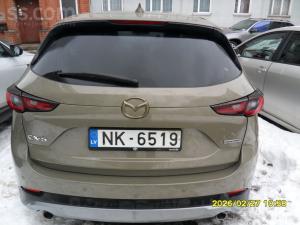 Green Mazda CX-5 2023 in Riga, with an engine capacity of 2.50 L and mileage of 52 thousand km for 25000 €, photo 7 on AUTOMOTO.COM.LV