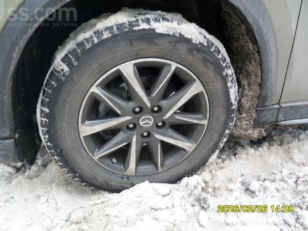 Green Mazda CX-5 2023 in Riga, with an engine capacity of 2.50 L and mileage of 52 thousand km for 25000 €, photo 8 on AUTOMOTO.COM.LV