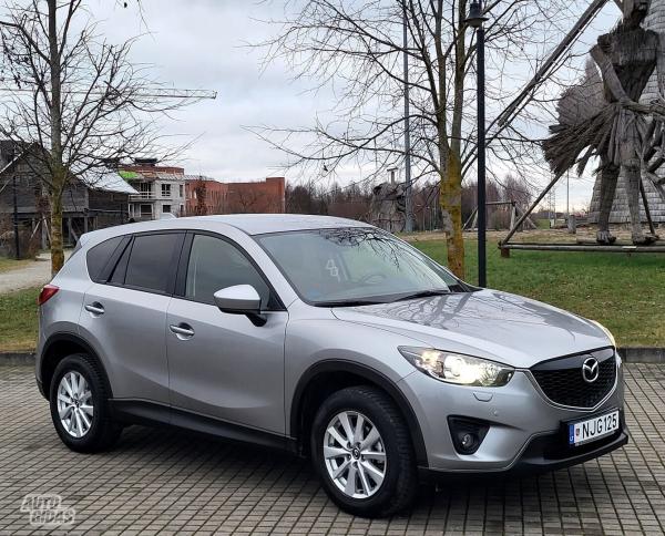 Grey Mazda CX-5 2012 in Siauliai, with an engine capacity of 2.20 L and mileage of 214 thousand km for 5950 €, photo 3 on AUTOMOTO.COM.LV