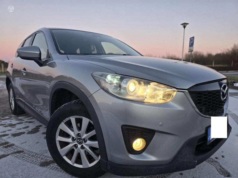Grey Mazda CX-5 2012 in Siauliai, with an engine capacity of 2.20 L and mileage of 258 thousand km for 5990 €, photo 4 on AUTOMOTO.COM.LV