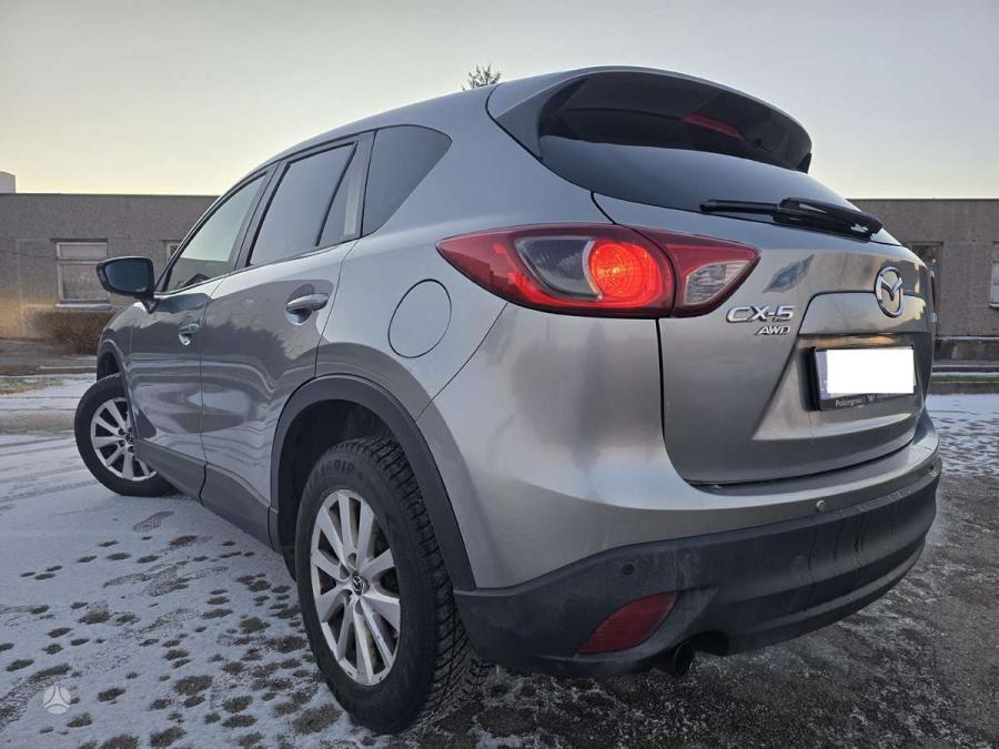 Grey Mazda CX-5 2012 in Siauliai, with an engine capacity of 2.20 L and mileage of 258 thousand km for 5990 €, photo 13 on AUTOMOTO.COM.LV