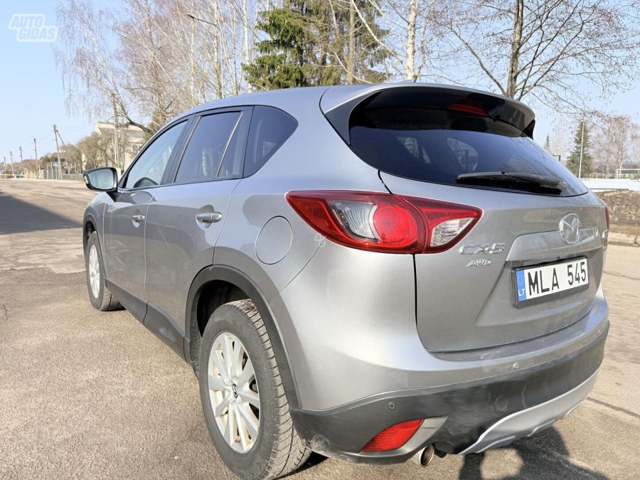 Grey Mazda CX-5 2012 in Sakiai, with an engine capacity of 2.20 L and mileage of 255 thousand km for 7000 €, photo 3 on AUTOMOTO.COM.LV