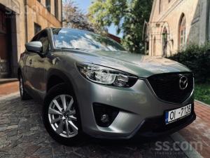 Pelēks Mazda CX-5 2012 Cēsis, ar dzinēja tilpumu 2.20 L un nobraukumu 0 tūkst. km par 6990 €, foto  vietnē AUTOMOTO.COM.LV