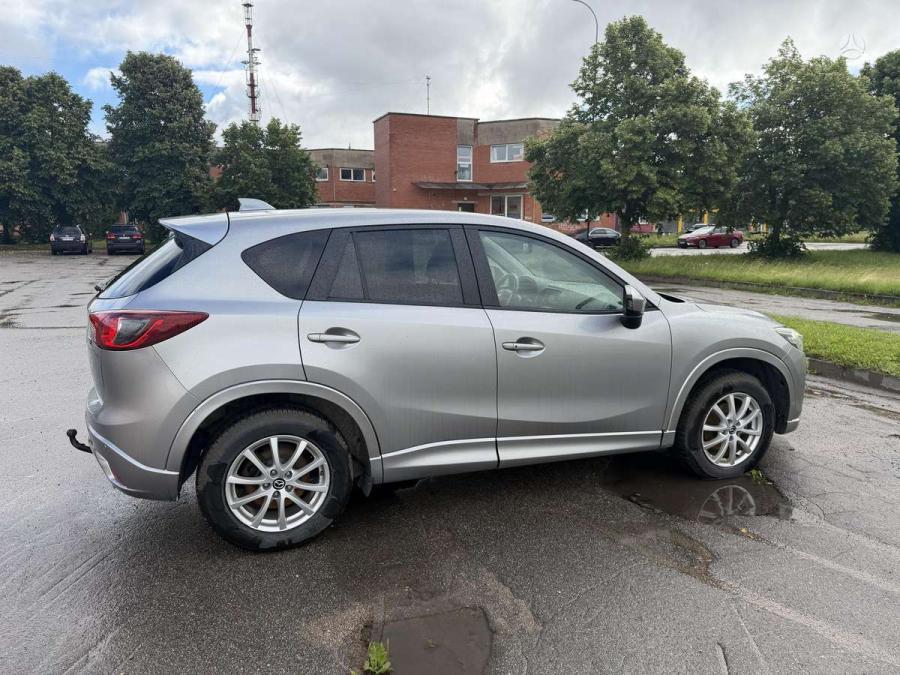 Grey Mazda CX-5 2012 in Siauliai, with an engine capacity of 2.19 L and mileage of 240 thousand km for 3400 €, photo 4 on AUTOMOTO.COM.LV