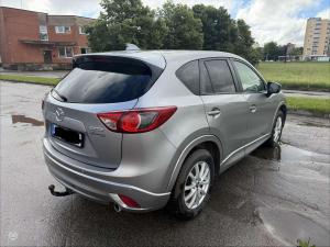 Grey Mazda CX-5 2012 in Siauliai, with an engine capacity of 2.19 L and mileage of 240 thousand km for 3400 €, photo 5 on AUTOMOTO.COM.LV