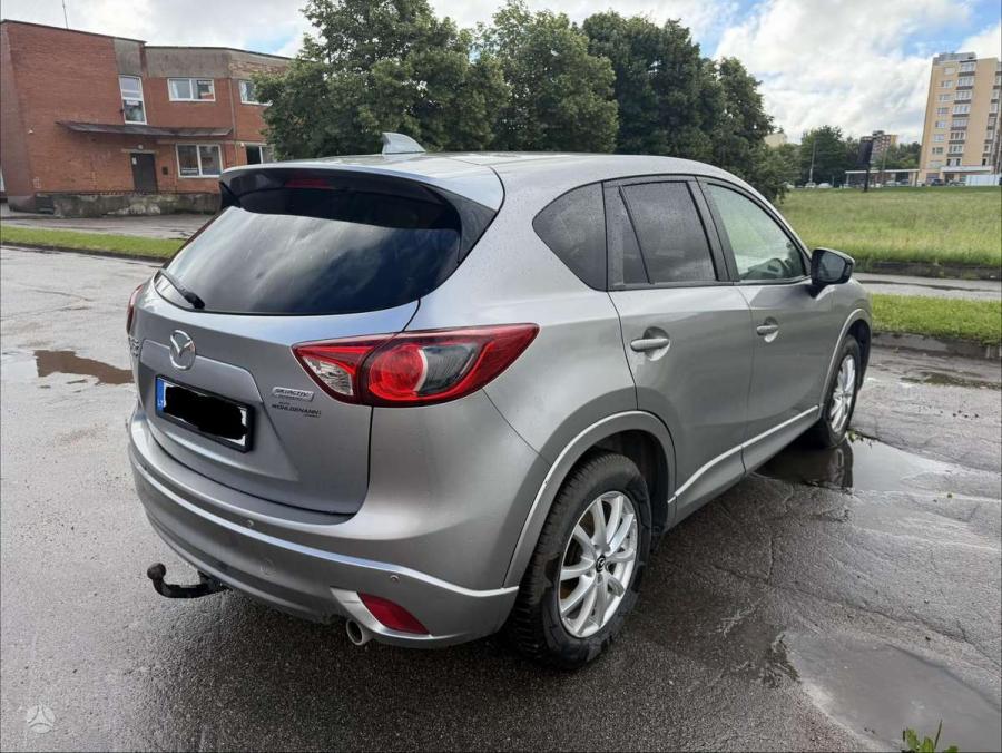 Grey Mazda CX-5 2012 in Siauliai, with an engine capacity of 2.19 L and mileage of 240 thousand km for 3400 €, photo 5 on AUTOMOTO.COM.LV