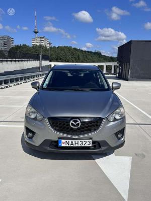 Grey Mazda CX-5 2012 in Vilnius, with an engine capacity of 2.19 L and mileage of 179 thousand km for 7600 €, photo 3 on AUTOMOTO.COM.LV