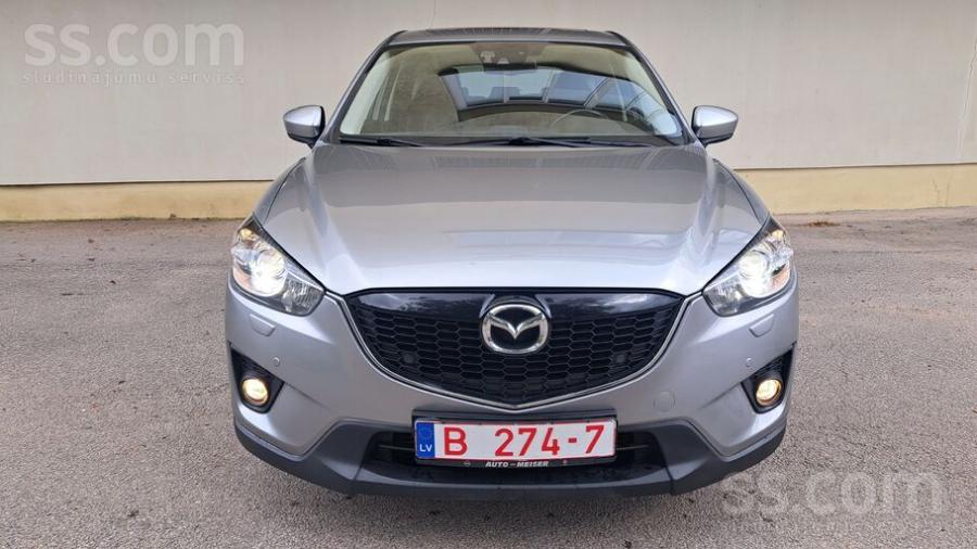 Grey Mazda CX-5 2012 in Ogre, with an engine capacity of 2.20 L and mileage of 169 thousand km for 7550 €, photo 4 on AUTOMOTO.COM.LV