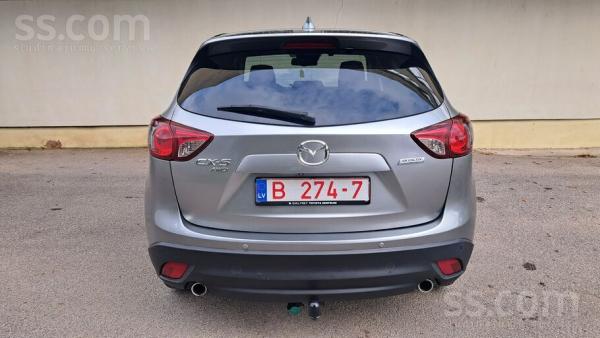 Pelēks Mazda CX-5 2012 Ogre, ar dzinēja tilpumu 2.20 L un nobraukumu 169 tūkst. km par 7550 €, foto 8 vietnē AUTOMOTO.COM.LV