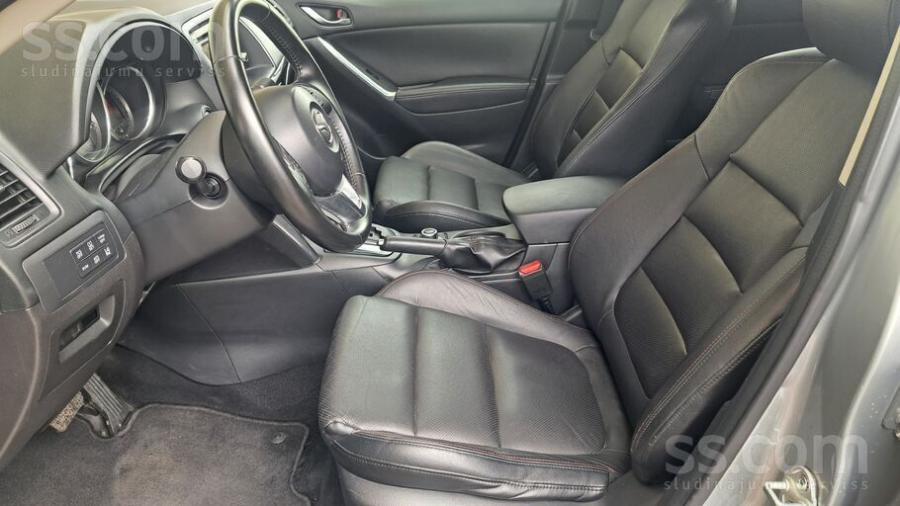 Grey Mazda CX-5 2012 in Ogre, with an engine capacity of 2.20 L and mileage of 169 thousand km for 7550 €, photo 15 on AUTOMOTO.COM.LV