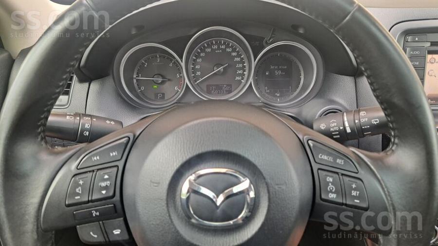 Grey Mazda CX-5 2012 in Ogre, with an engine capacity of 2.20 L and mileage of 169 thousand km for 7550 €, photo 17 on AUTOMOTO.COM.LV
