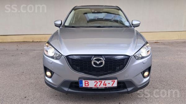 Pelēks Mazda CX-5 2012 Ogre, ar dzinēja tilpumu 2.20 L un nobraukumu 169 tūkst. km par 7550 €, foto 4 vietnē AUTOMOTO.COM.LV