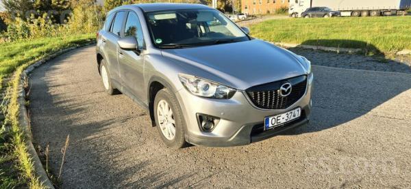 Grey Mazda CX-5 2012 in Daugavpils, with an engine capacity of 2.20 L and mileage of 203 thousand km for 8700 €, photo 1 on AUTOMOTO.COM.LV