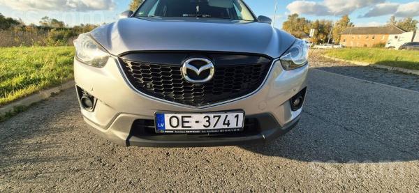 Grey Mazda CX-5 2012 in Daugavpils, with an engine capacity of 2.20 L and mileage of 203 thousand km for 8700 €, photo 4 on AUTOMOTO.COM.LV