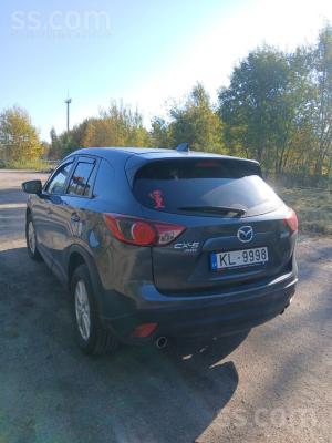 Pelēks Mazda CX-5 2012 Rīga, ar dzinēja tilpumu 2.20 L un nobraukumu 210 tūkst. km par 6950 €, foto 4 vietnē AUTOMOTO.COM.LV