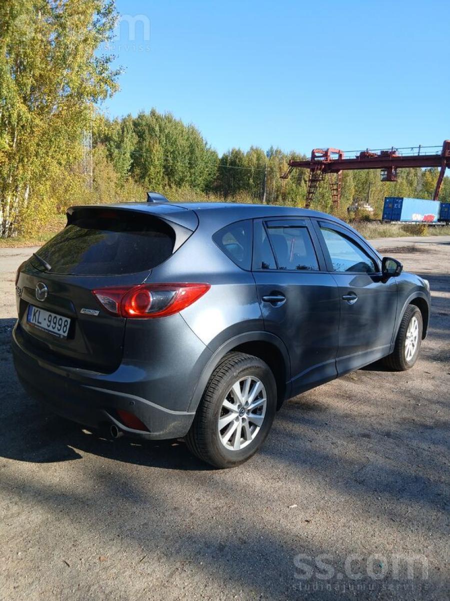 Pelēks Mazda CX-5 2012 Rīga, ar dzinēja tilpumu 2.20 L un nobraukumu 210 tūkst. km par 6950 €, foto 5 vietnē AUTOMOTO.COM.LV