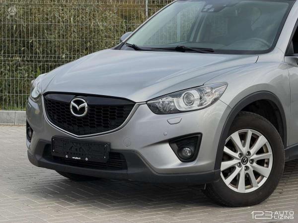 Grey Mazda CX-5 2012 in Taurage, with an engine capacity of 2.20 L and mileage of 295 thousand km for 4999 €, photo 3 on AUTOMOTO.COM.LV
