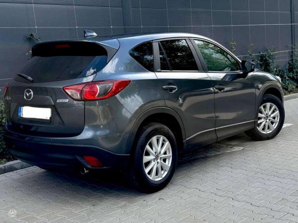 Grey Mazda CX-5 2013 in Klaipeda, with an engine capacity of 2.19 L and mileage of 297 thousand km for 6750 €, photo 8 on AUTOMOTO.COM.LV