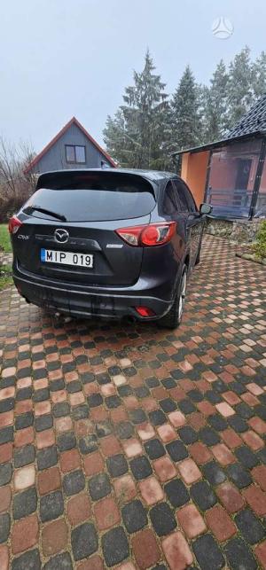 Pelēks Mazda CX-5 2013 Viļņa, ar dzinēja tilpumu 2.19 L un nobraukumu 239 tūkst. km par 5700 €, foto  vietnē AUTOMOTO.COM.LV