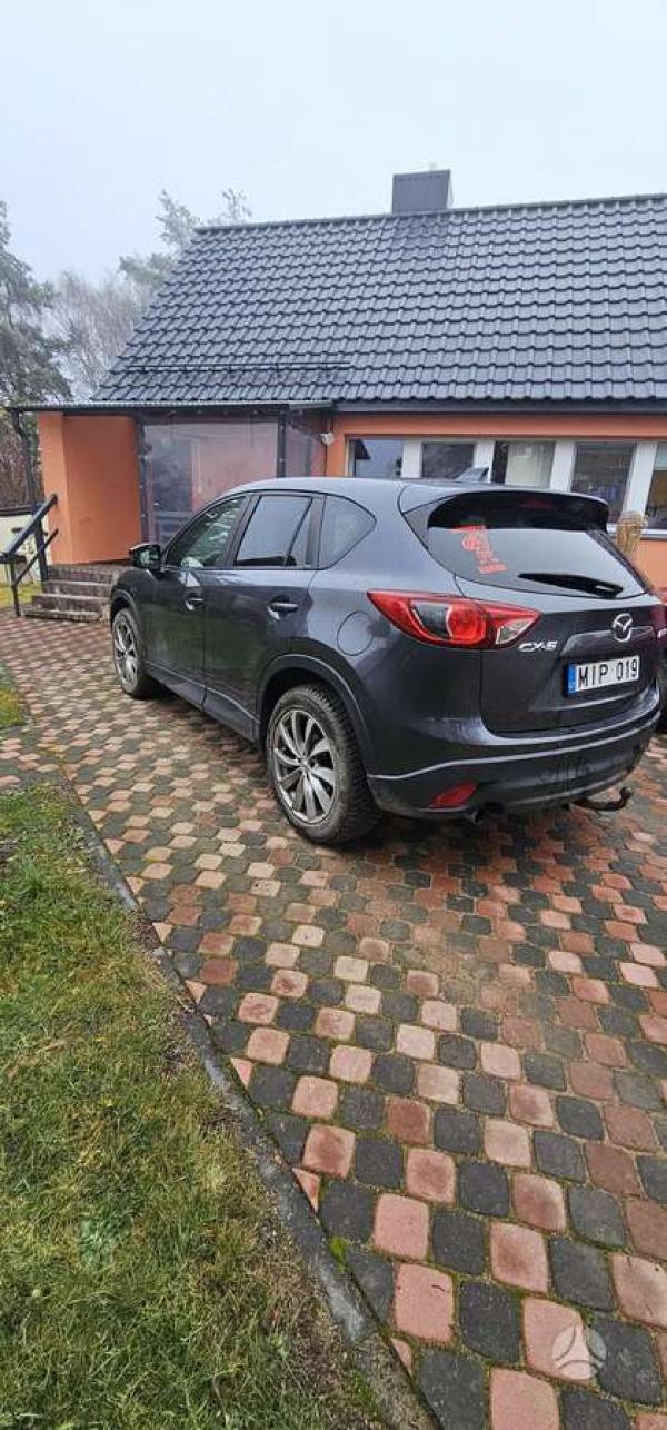 Grey Mazda CX-5 2013 in Vilnius, with an engine capacity of 2.19 L and mileage of 239 thousand km for 5000 €, photo 2 on AUTOMOTO.COM.LV